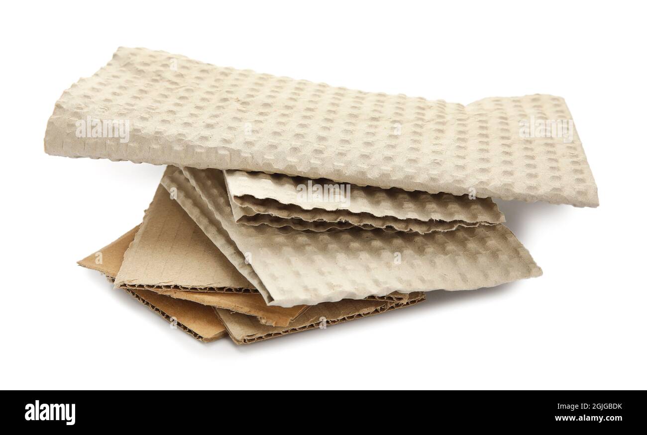 Pieces of cardboard on white background Stock Photo - Alamy