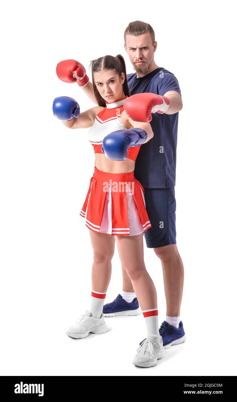 Cheerleader and boxer on white background Stock Photo - Alamy