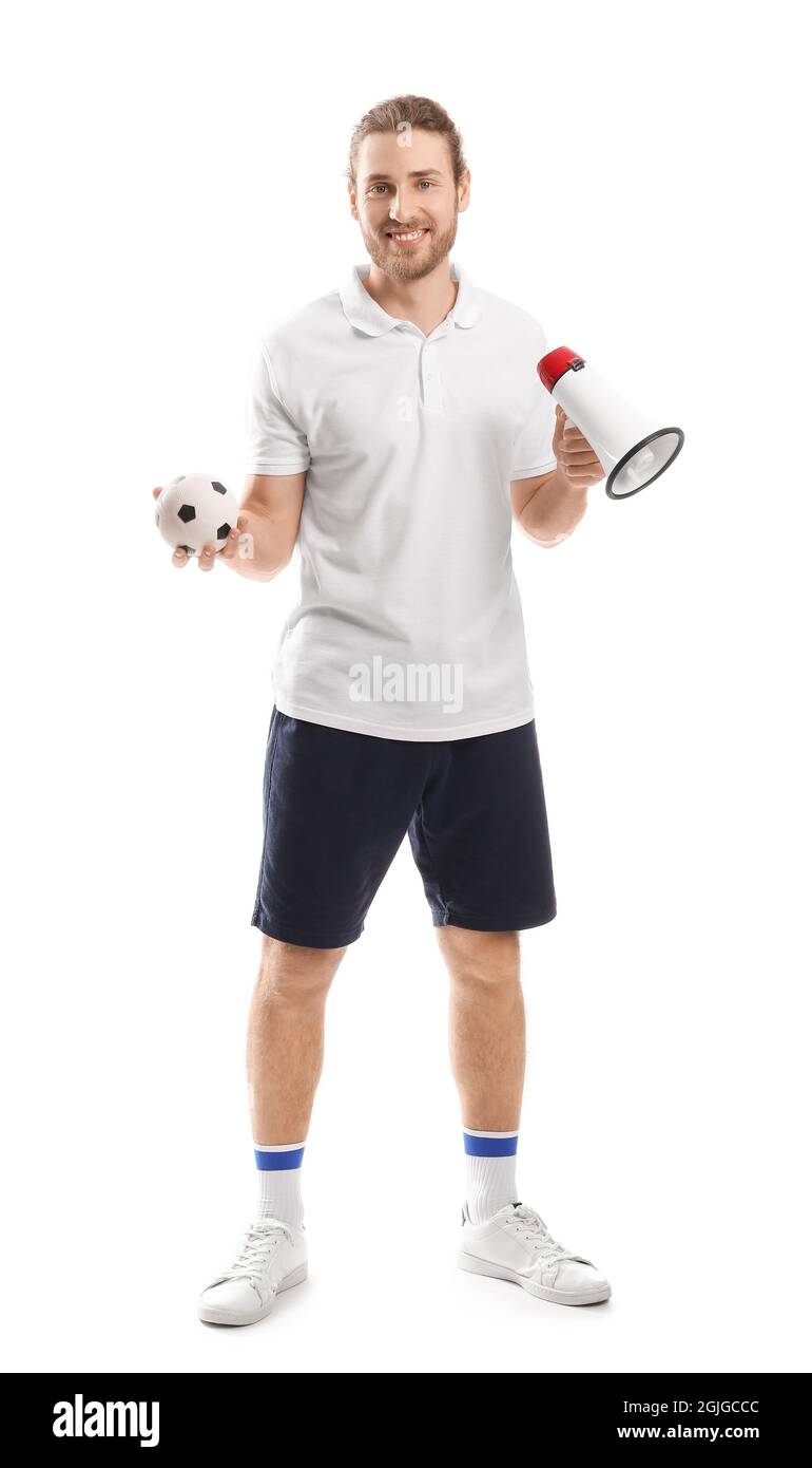 Sport fan with ball and megaphone on white background Stock Photo - Alamy