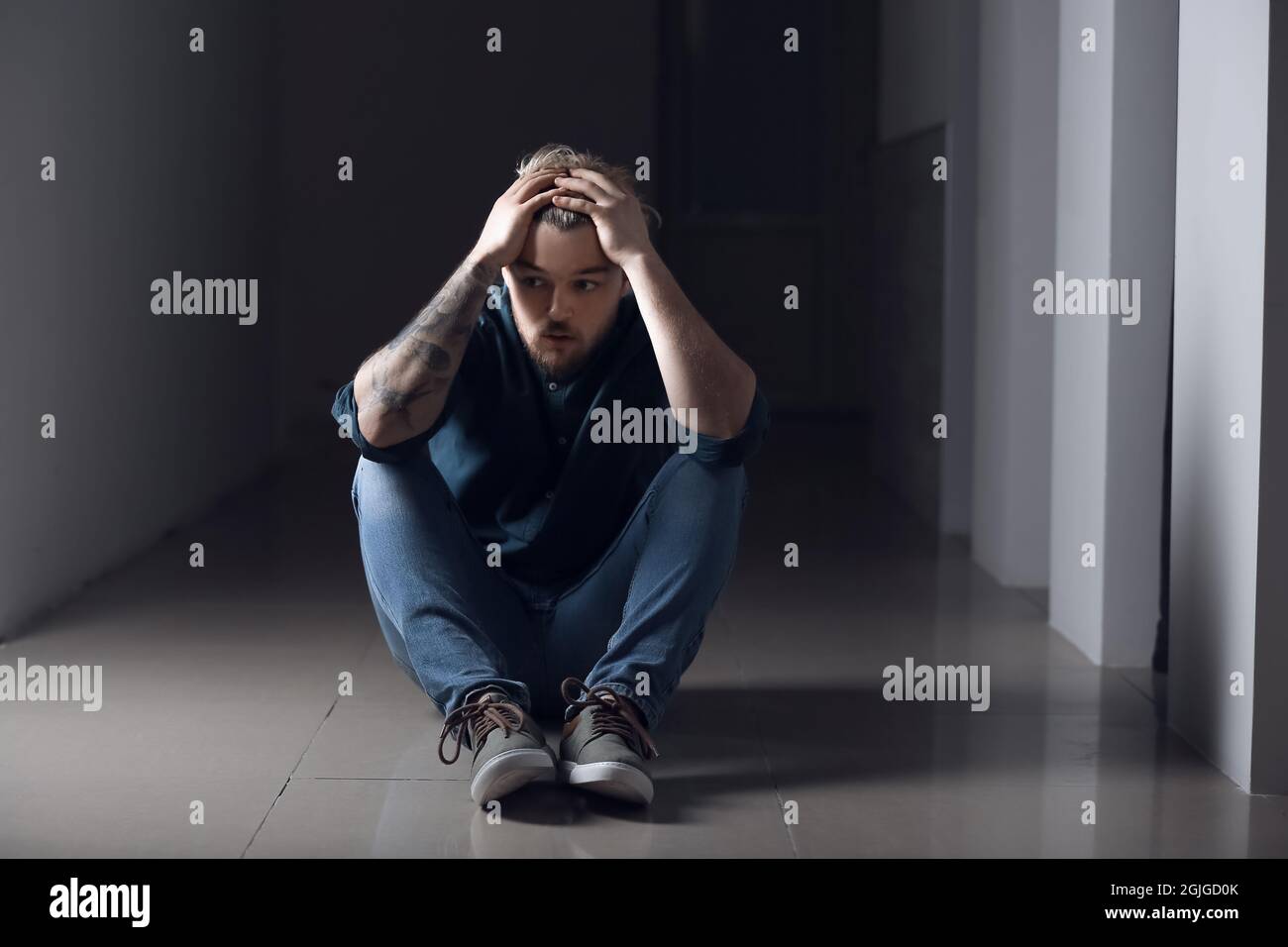 Suffering person in dark room hi-res stock photography and images - Alamy