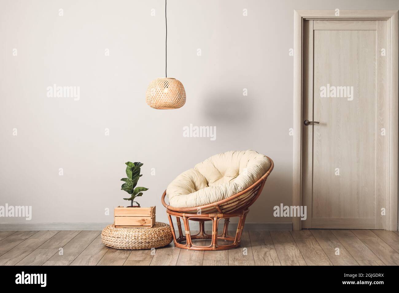 Interior of stylish modern room with armchair Stock Photo - Alamy