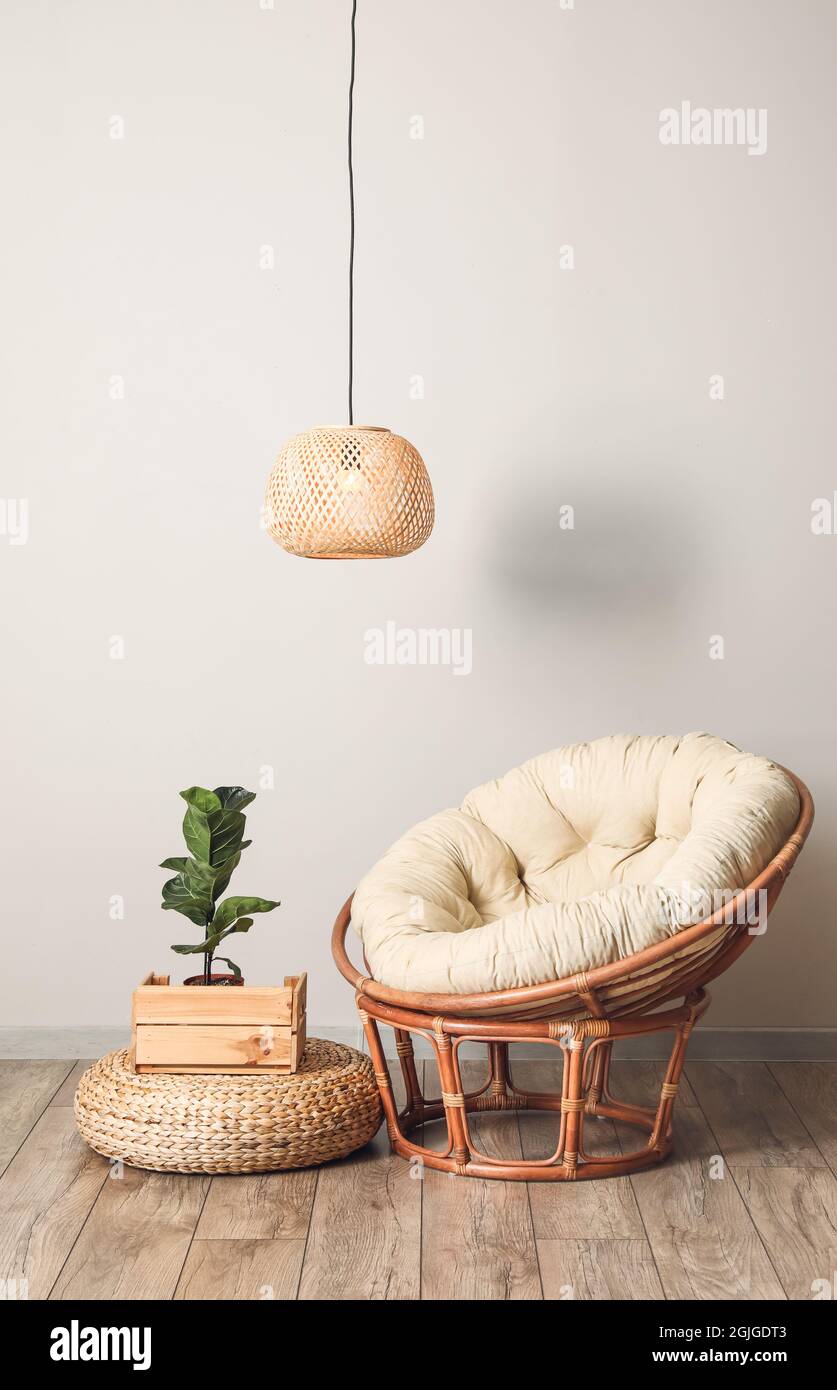 Interior of stylish modern room with armchair Stock Photo - Alamy