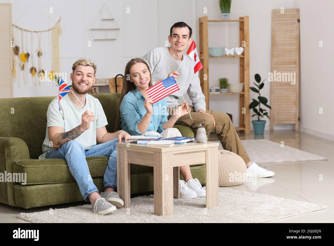 Young people with different flags at home Stock Photo - Alamy