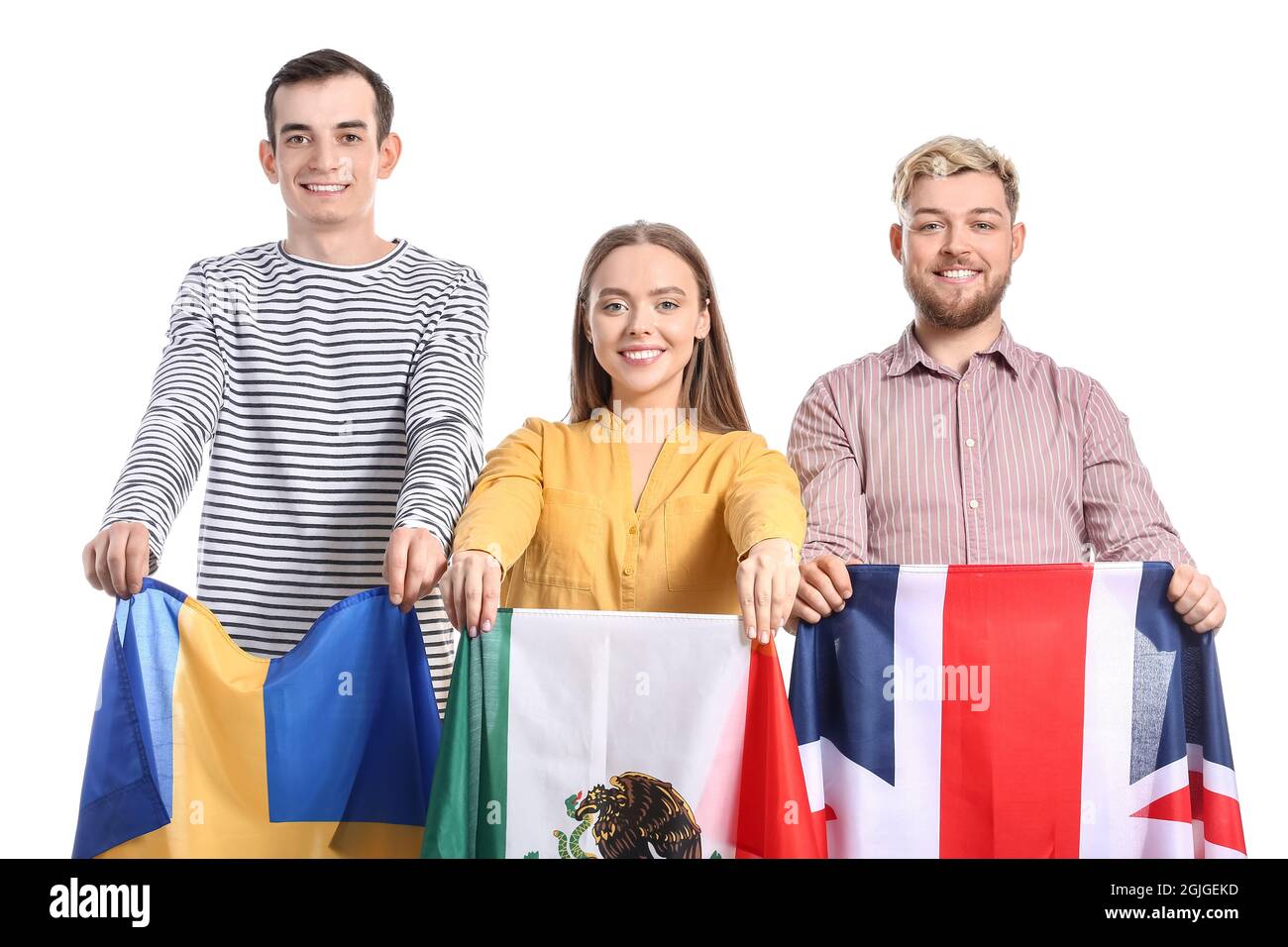 Young people with different flags on white background Stock Photo - Alamy