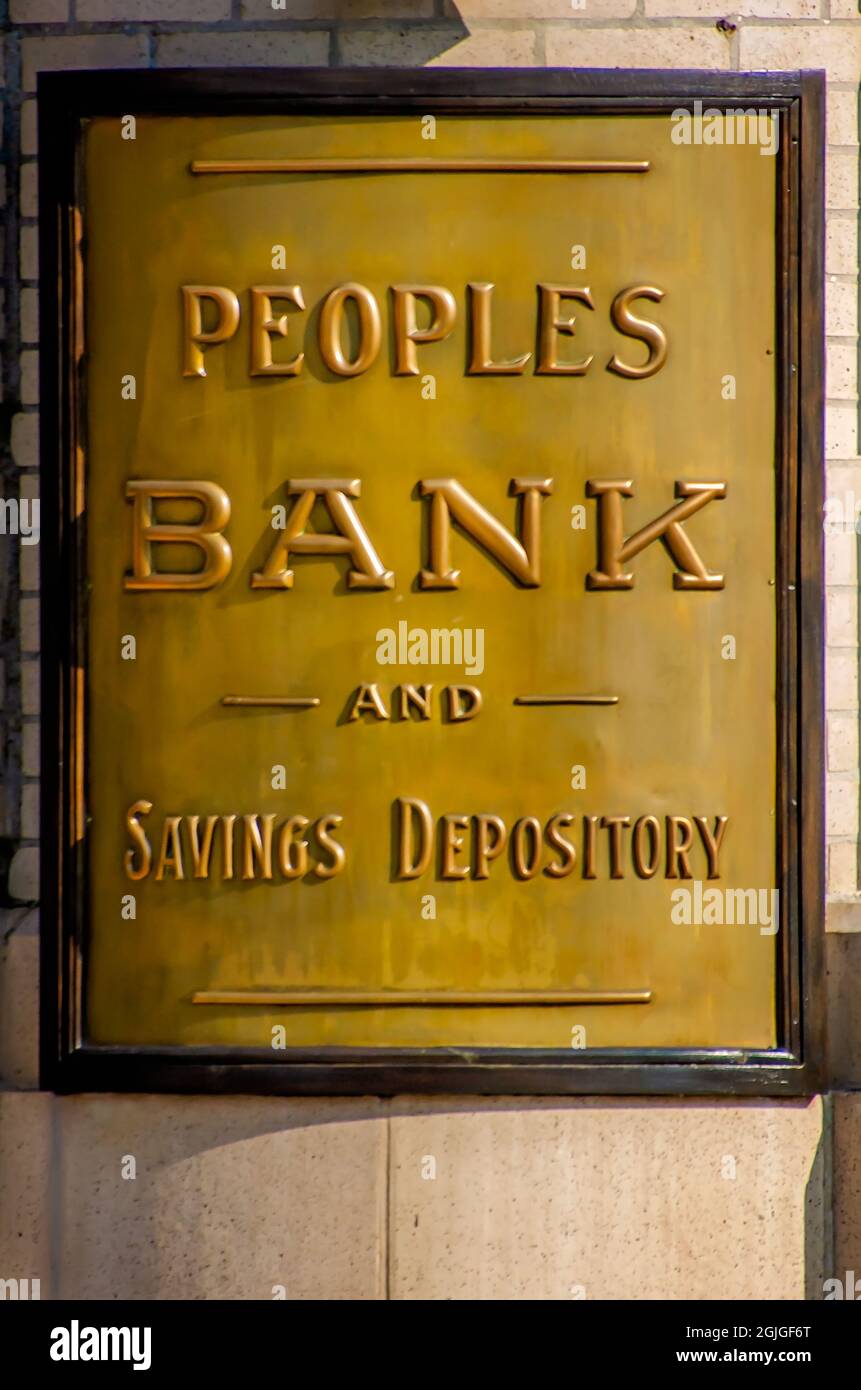 A bronze plaque is pictured on the corner of The Peoples Bank, Sept. 5 ...