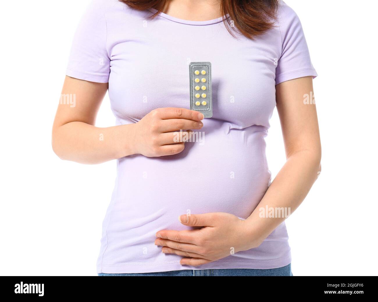 Young pregnant woman with Folic Acid pills on white background Stock ...