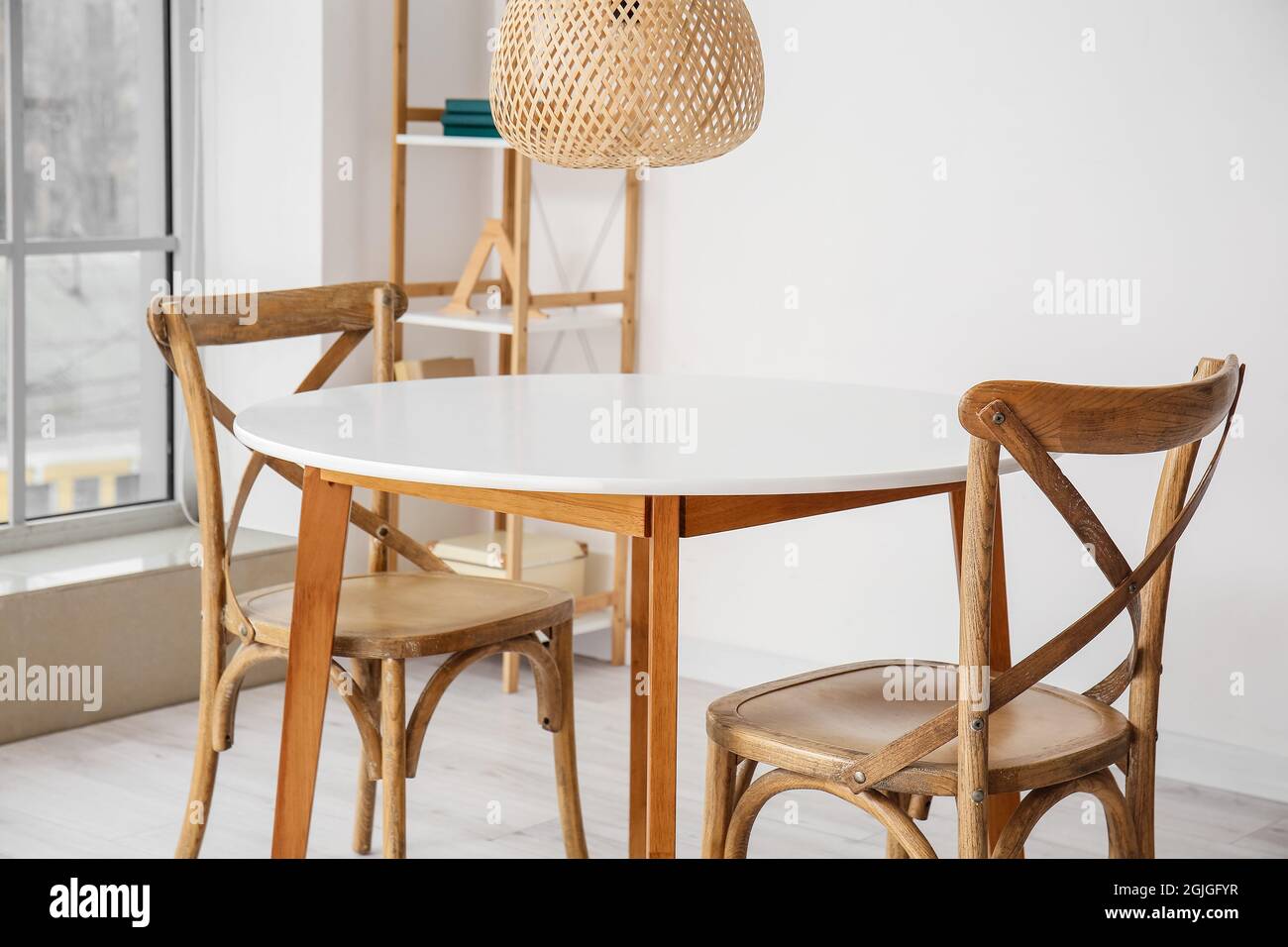 Dining table in interior of room Stock Photo - Alamy