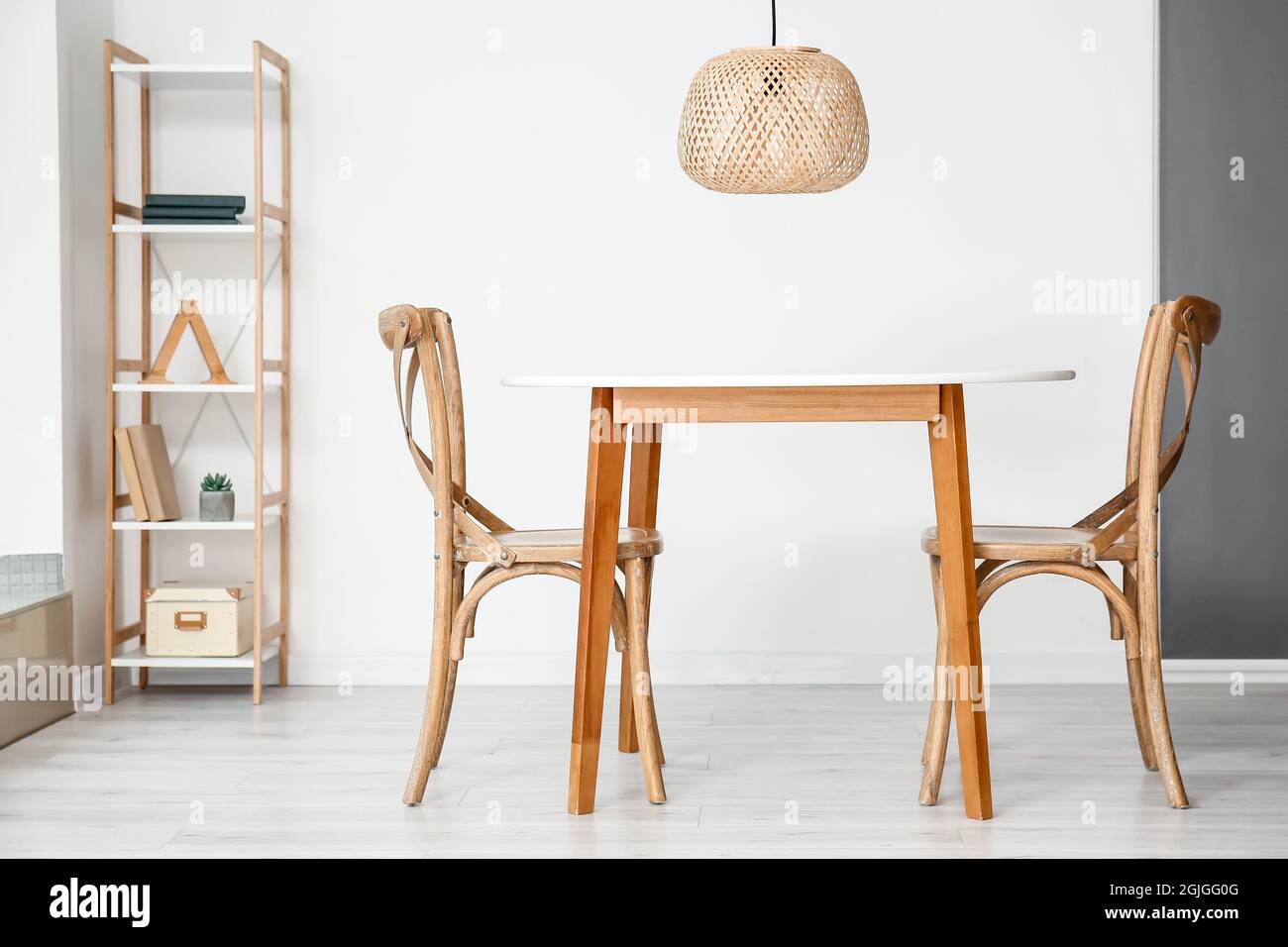 Dining table in interior of room Stock Photo - Alamy