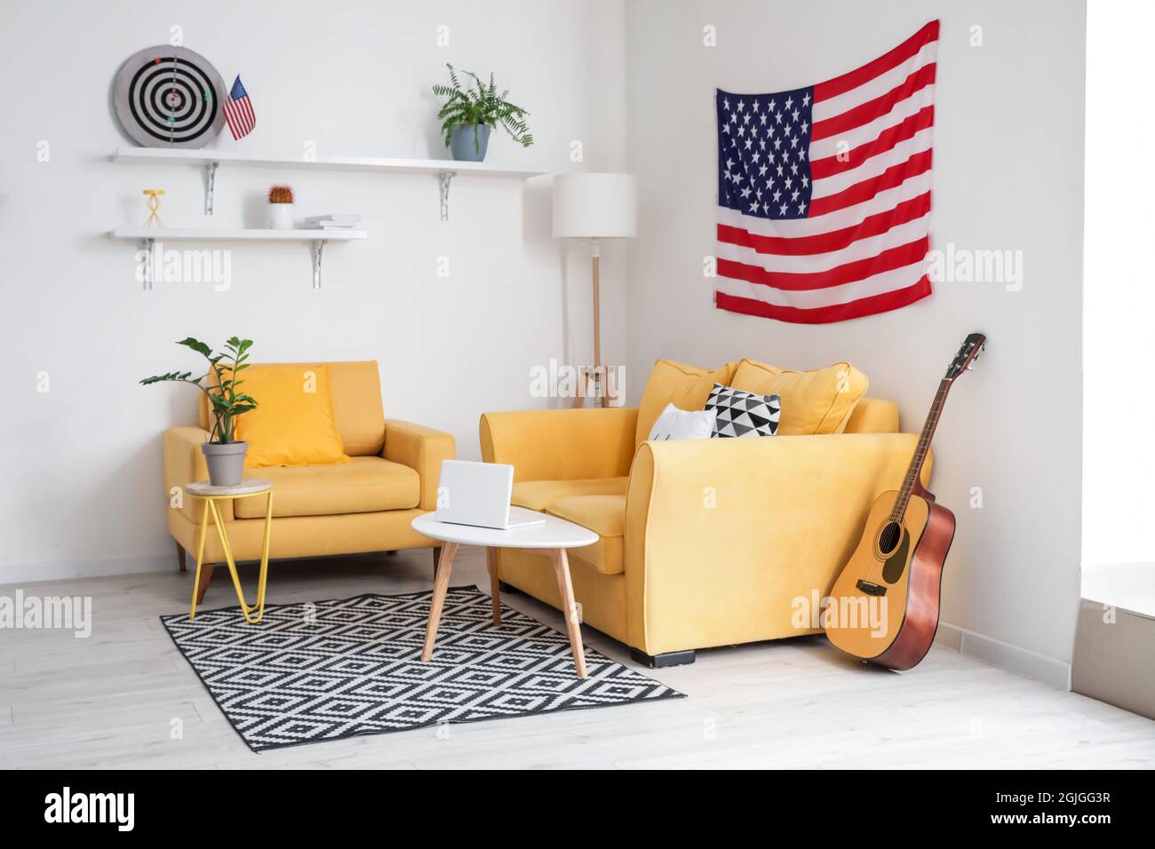 Interior of stylish living room with USA flag Stock Photo - Alamy