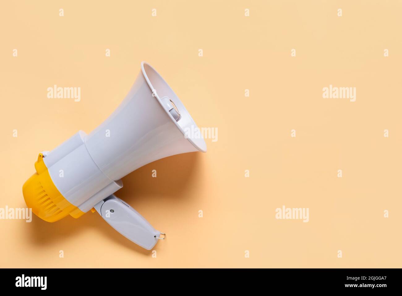 Modern megaphone on color background Stock Photo - Alamy