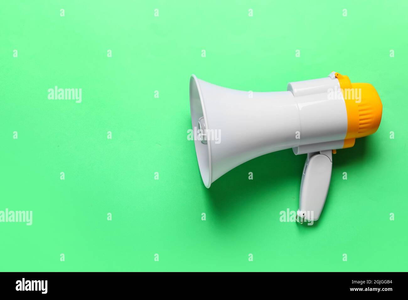 Modern megaphone on color background Stock Photo - Alamy
