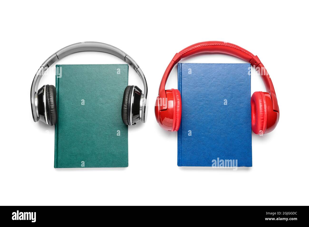 Modern headphones with books on white background Stock Photo - Alamy