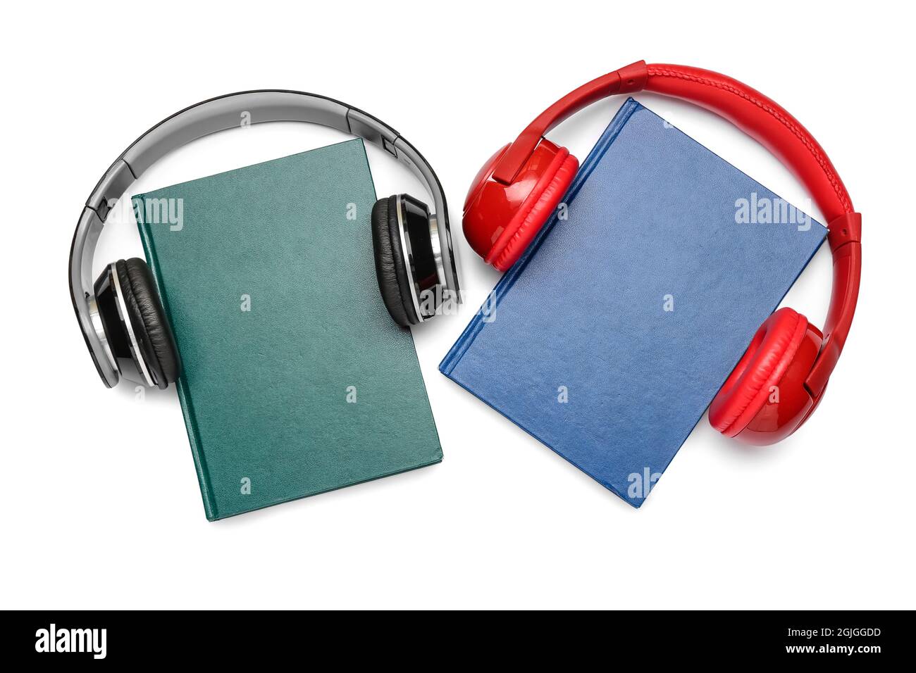 Modern headphones with books on white background Stock Photo - Alamy