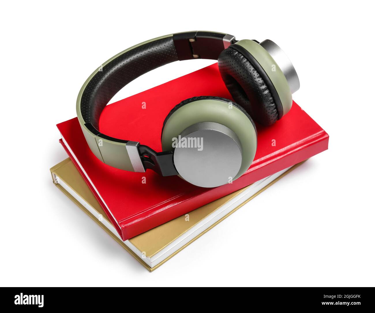 Modern headphones with books on white background Stock Photo - Alamy
