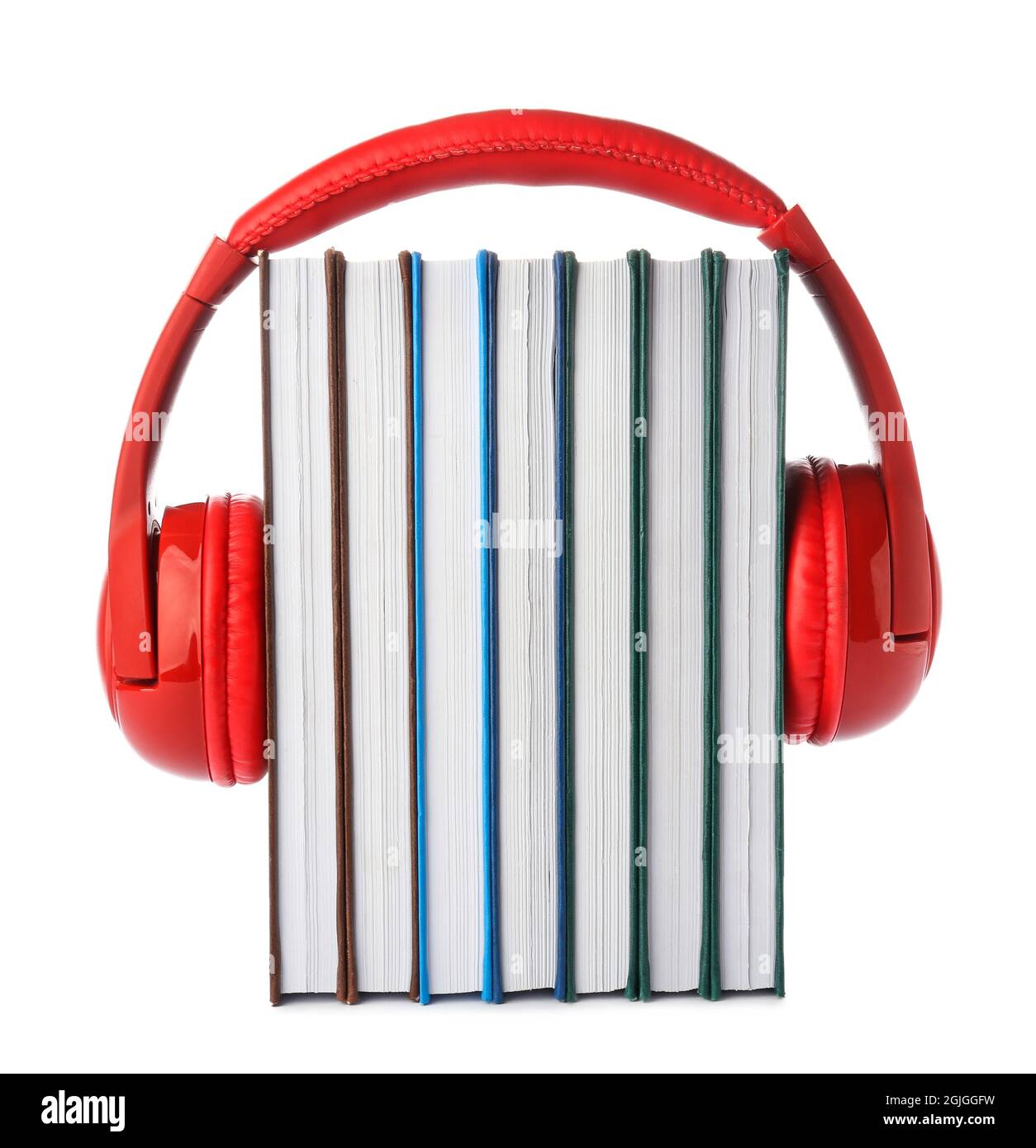 Modern headphones with books on white background Stock Photo - Alamy