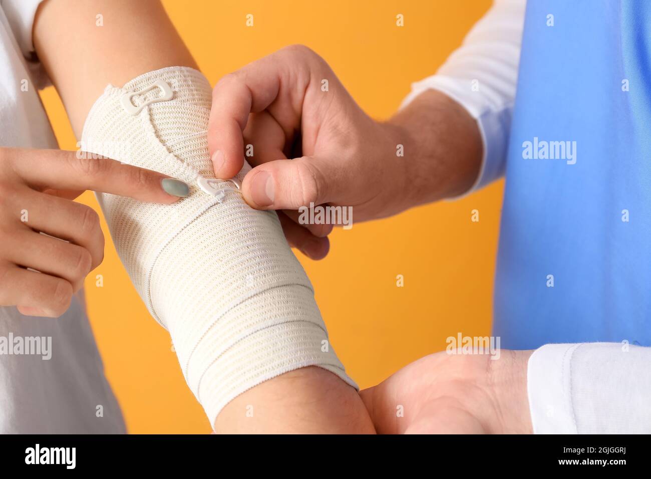Doctor hands cut orange color hi-res stock photography and images - Alamy