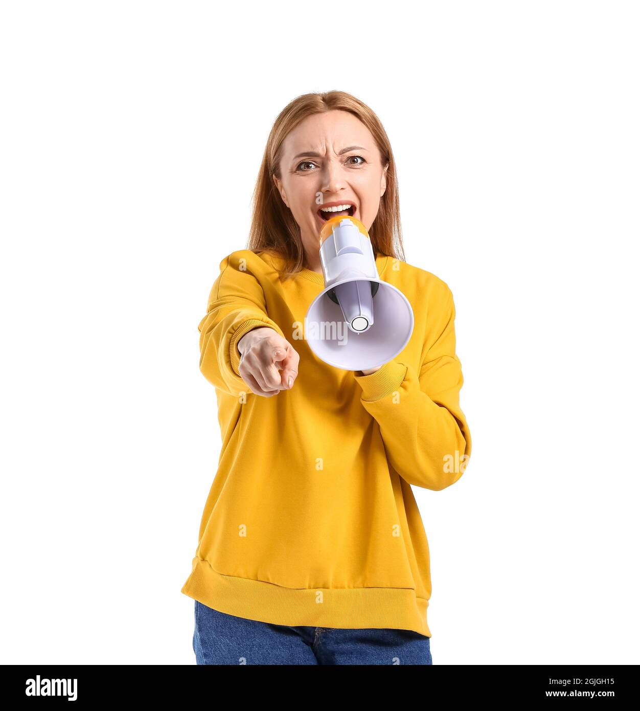 Angry mature woman shouting into megaphone on white background Stock ...