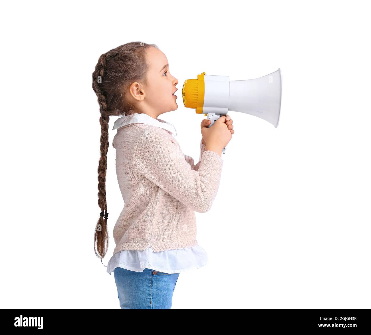 Little girl shouting into megaphone on white background Stock Photo - Alamy
