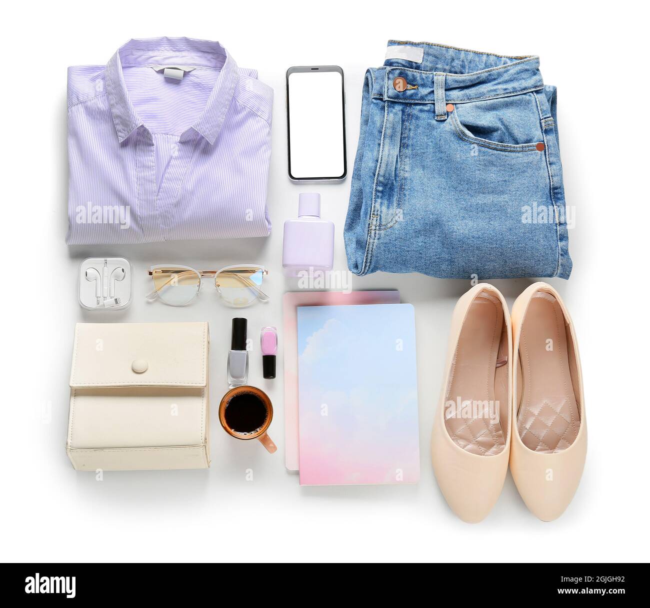 Female clothes, stylish accessories and mobile phone on white ...