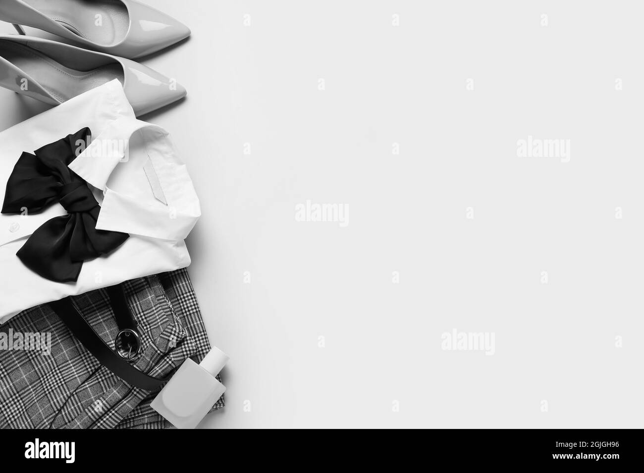 Stylish Female Clothes And Accessories On White Background Stock Photo stylish-female-clothes-and-accessories-on-white-background-stock-photo