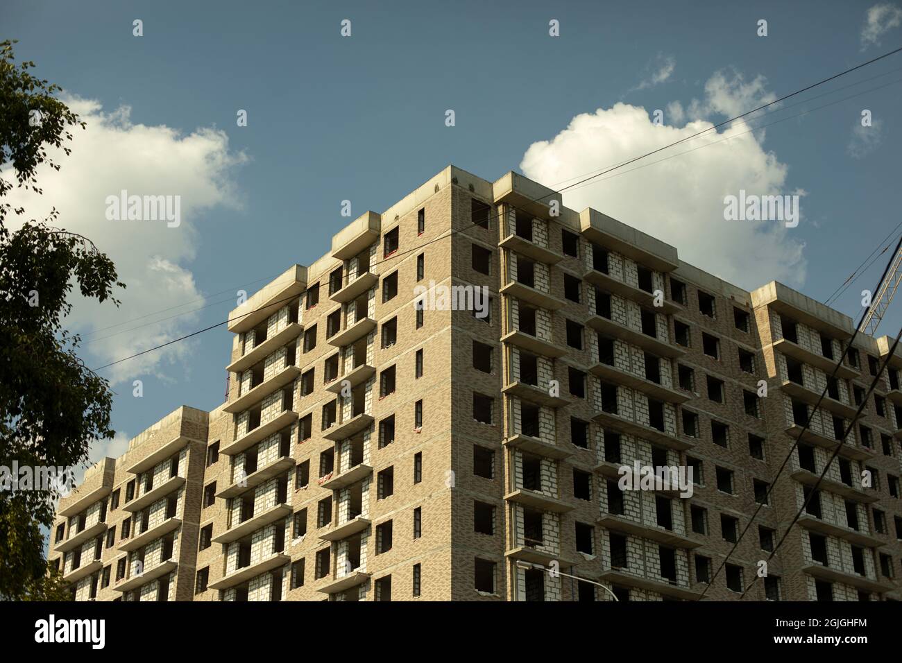 House under construction. Multistorey building. Big construction in the ...