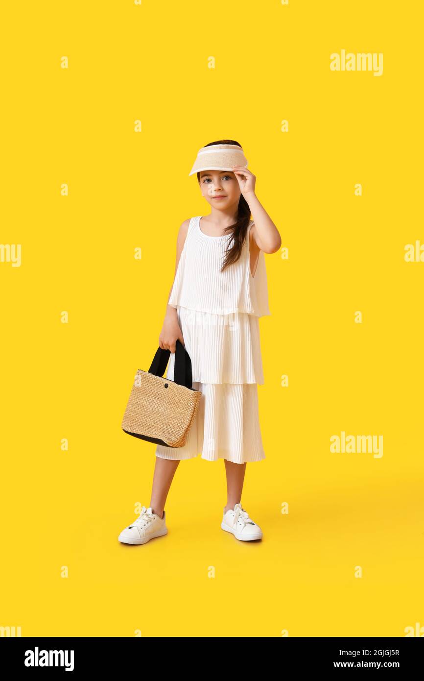 Cute little girl on color background Stock Photo - Alamy