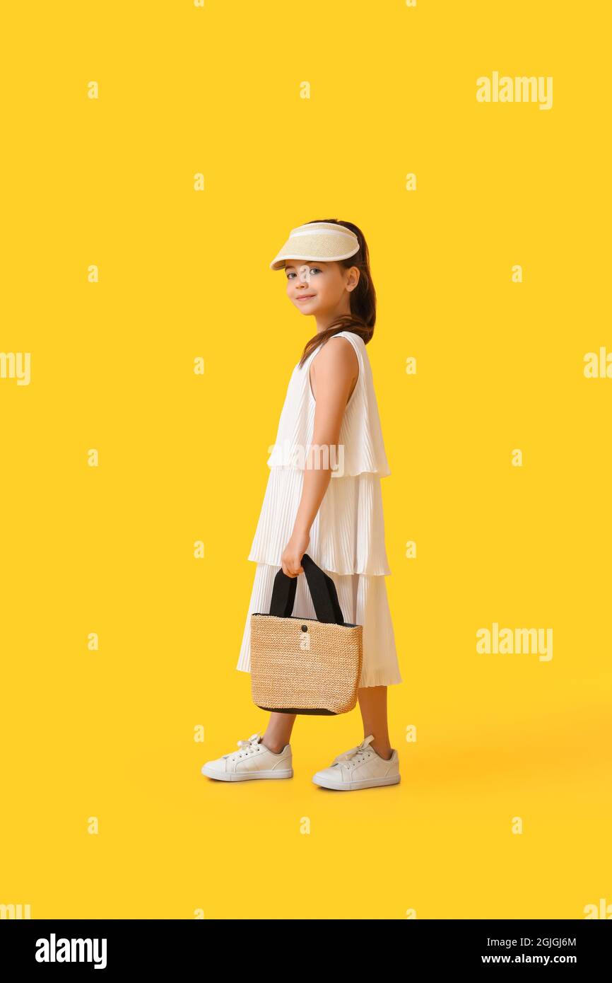 Cute little girl on color background Stock Photo - Alamy