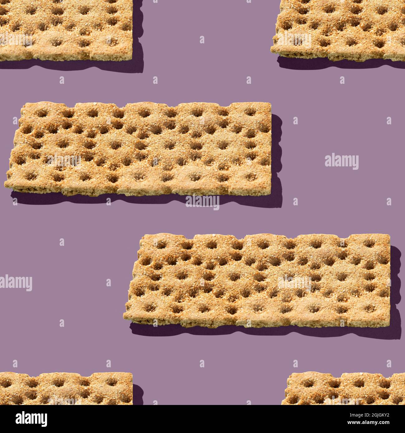 Photo in the form of a seamless pattern. Orange color crispbreads for ...