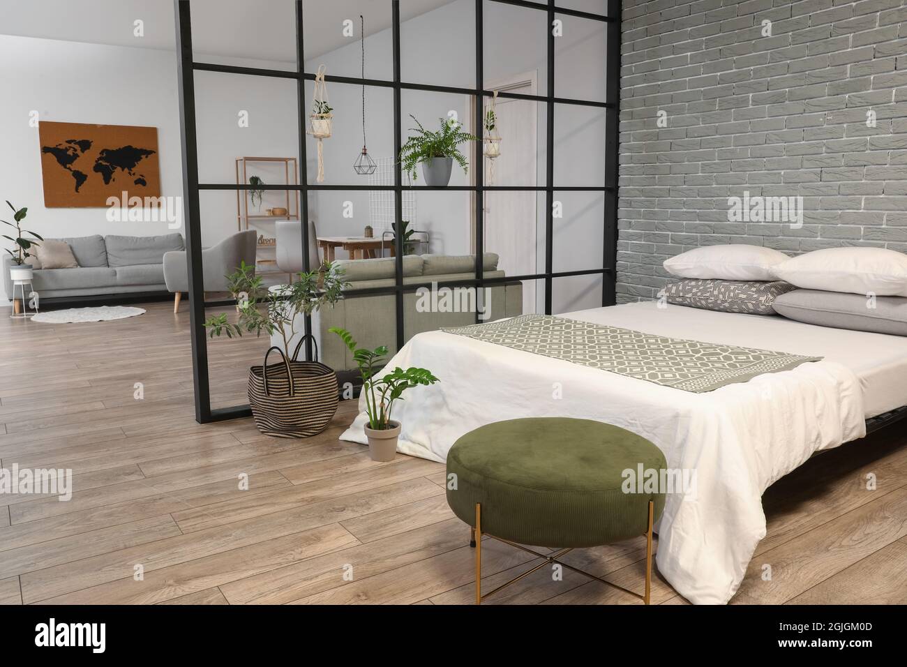Interior of stylish bedroom with folding screen Stock Photo - Alamy