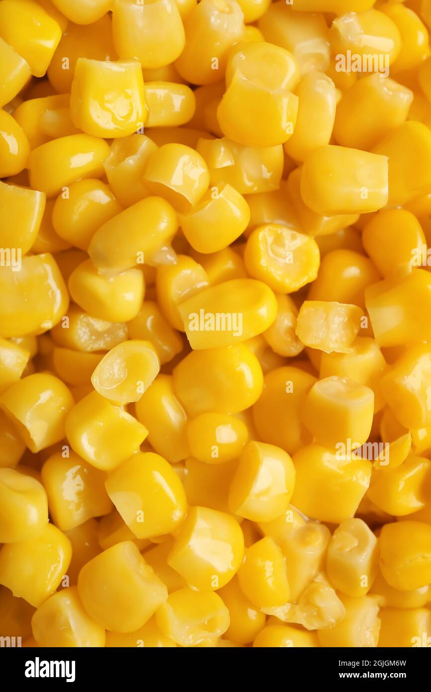 Canned corn kernels as background, closeup Stock Photo - Alamy