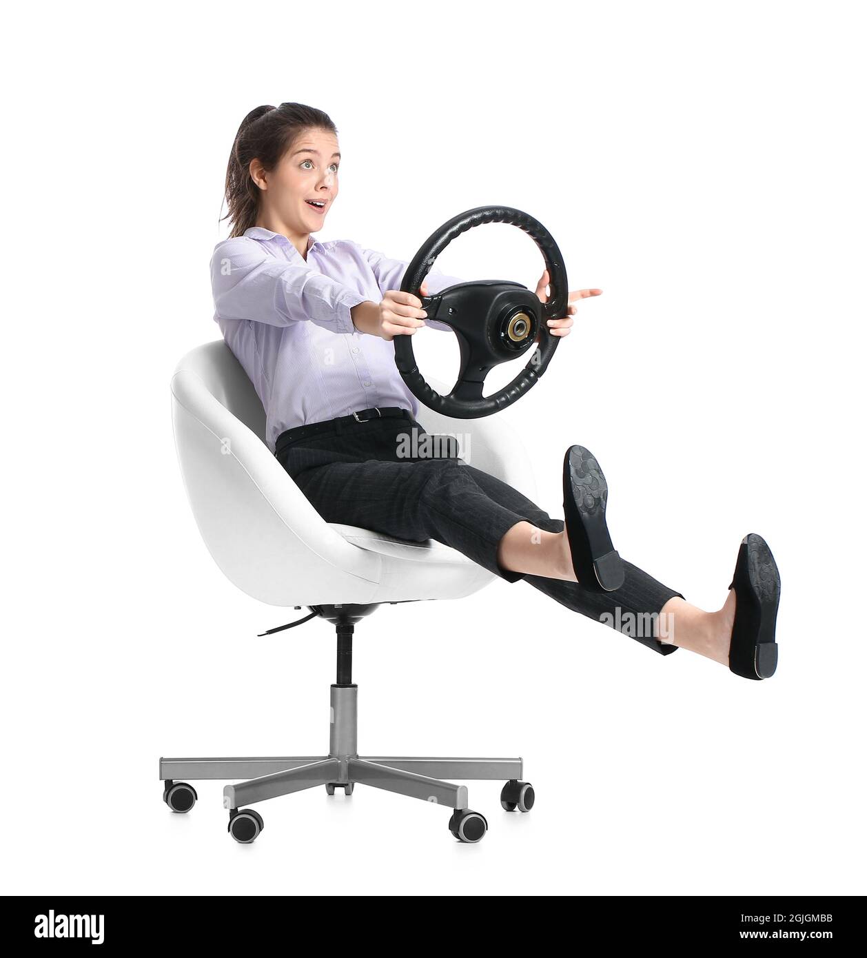 Young woman with steering wheel sitting in chair isolated on white ...