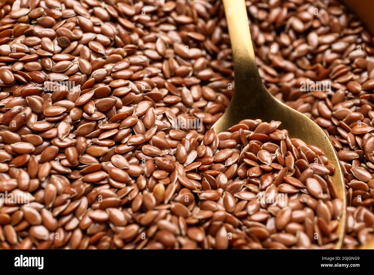 Flax seeds as background, closeup Stock Photo - Alamy