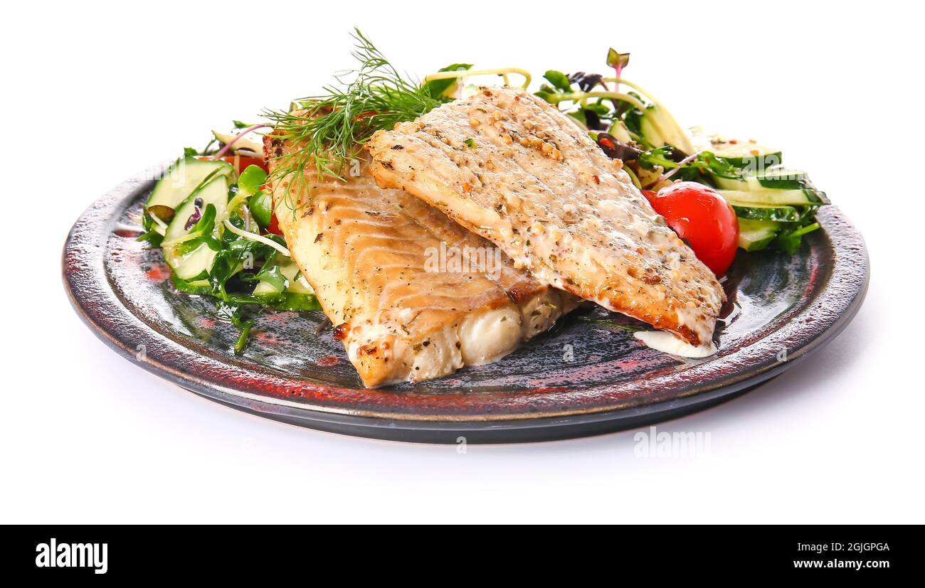 Plate with tasty baked cod fillet and vegetables on white background ...