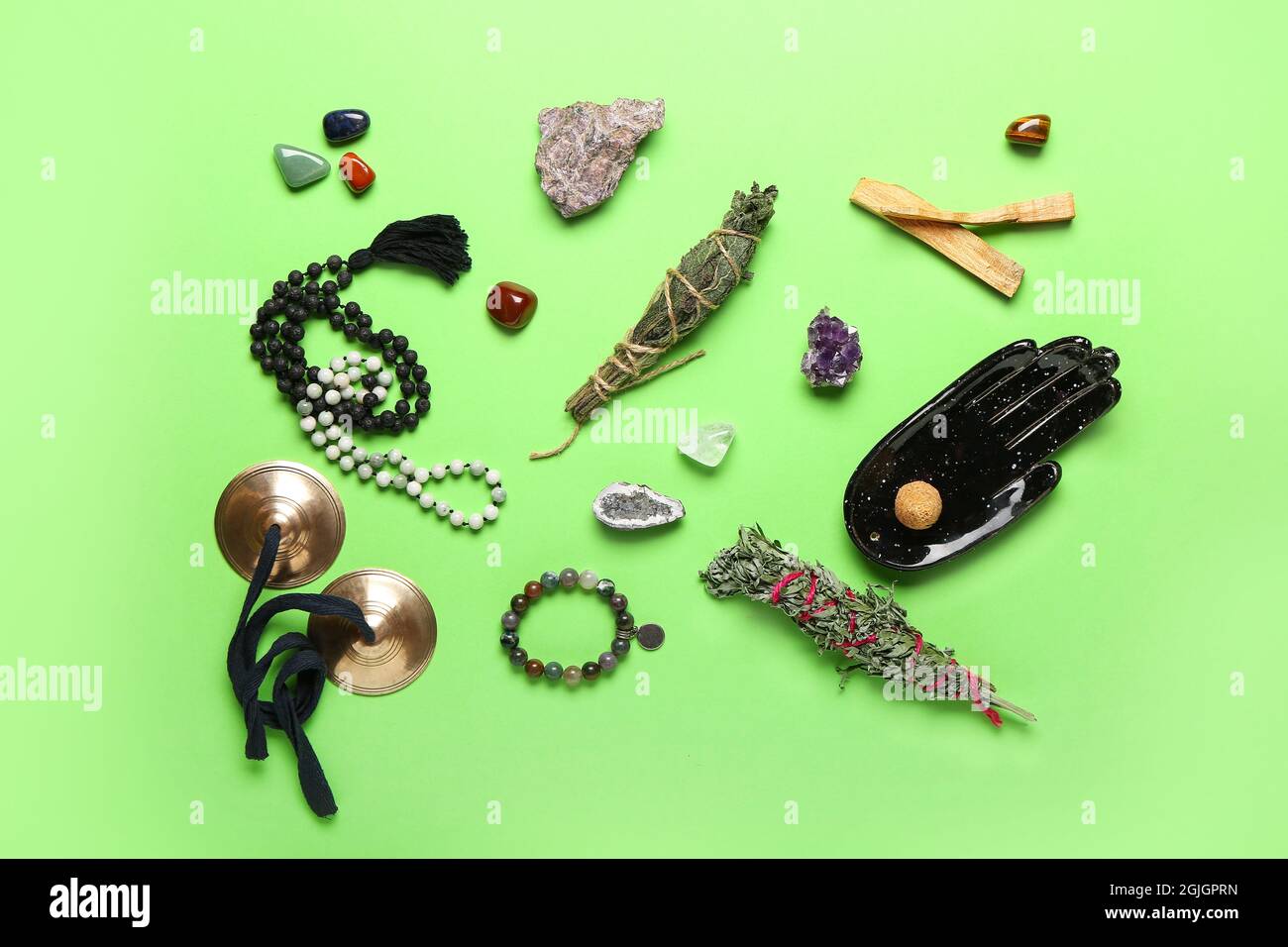 Composition with gemstones, karatalas and herbs for aura cleansing on ...