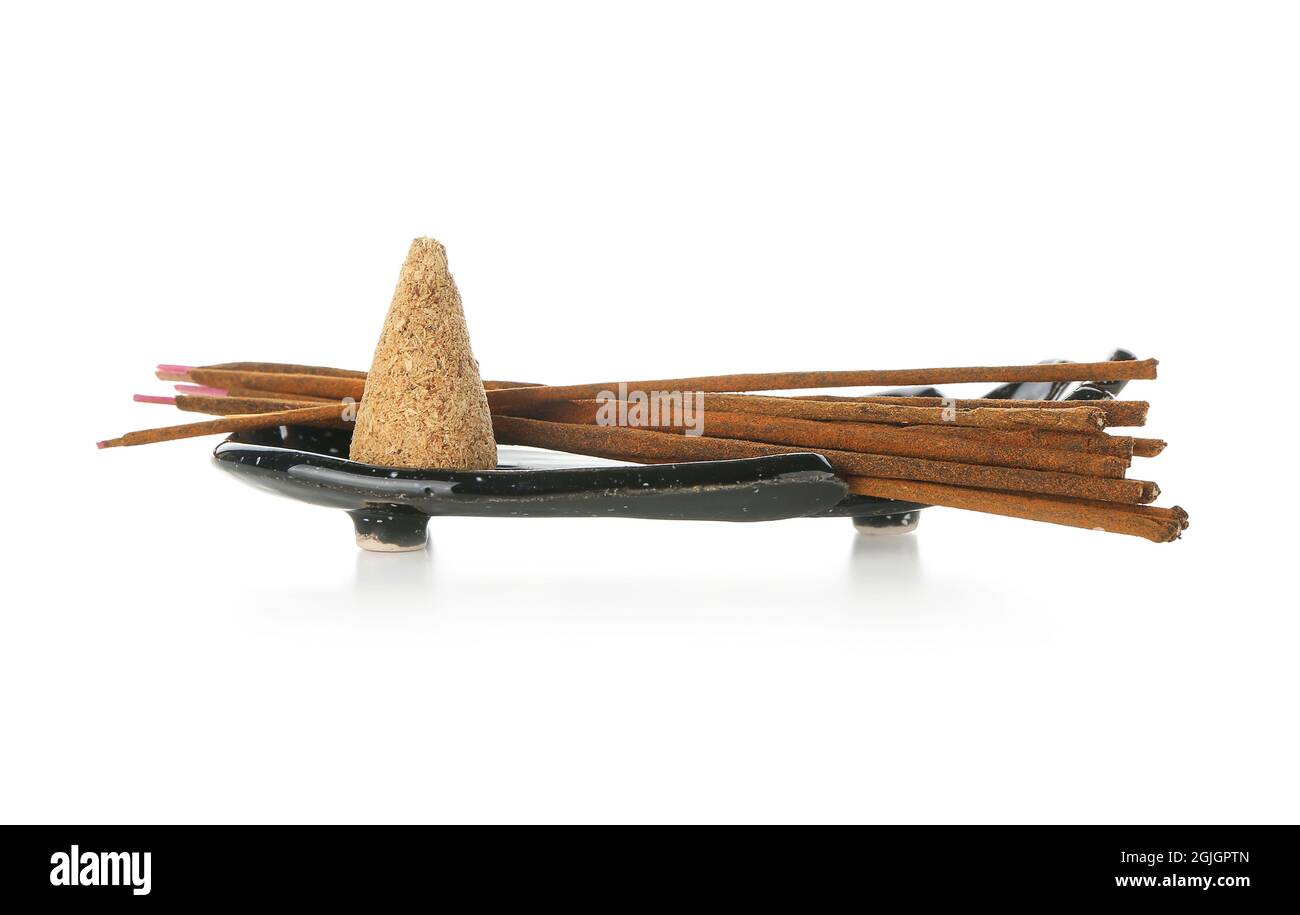 Incense sticks and cone on white background Stock Photo - Alamy