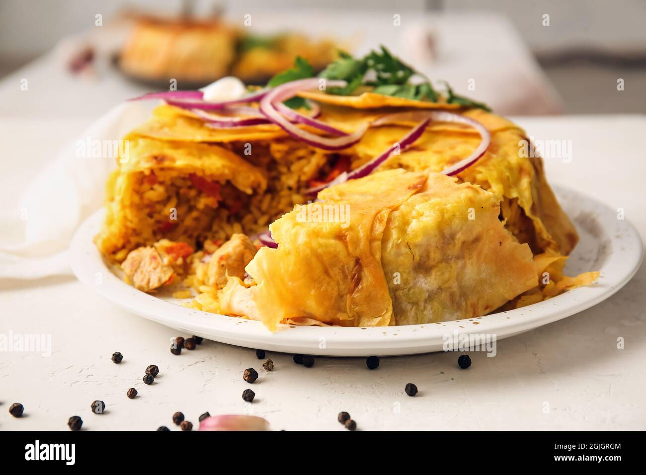 Plate with tasty Shah Pilaf on table Stock Photo - Alamy