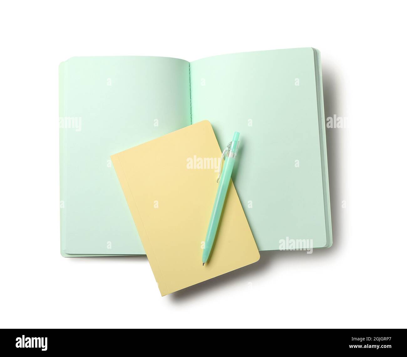 Stylish notebooks and pen on white background Stock Photo - Alamy