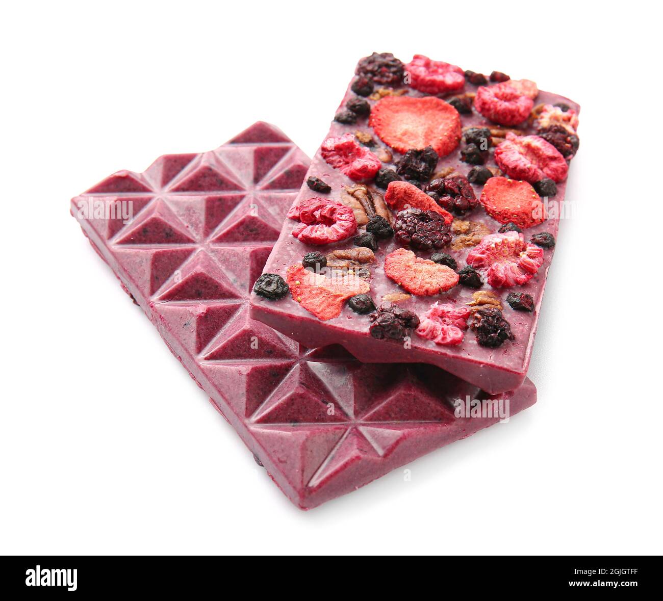 Handmade chocolate bars with fruits, berries and nuts on white ...