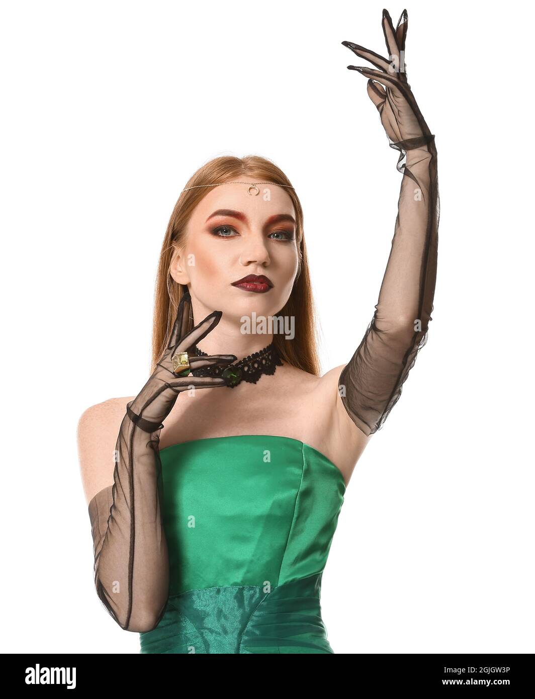 Beautiful woman dressed as witch for Halloween on white background ...