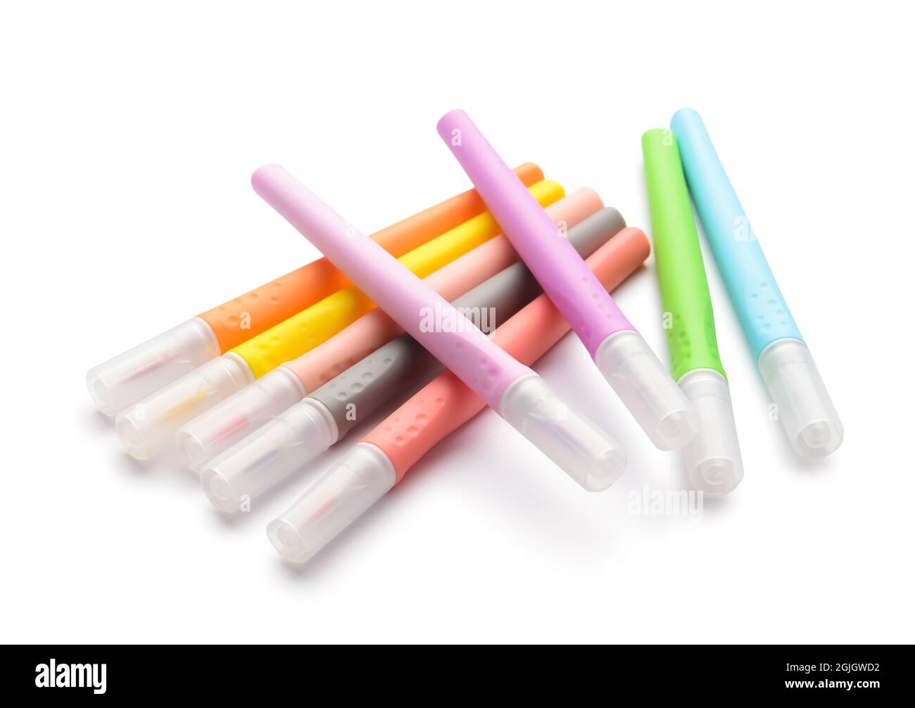 Different colorful markers on white background Stock Photo - Alamy
