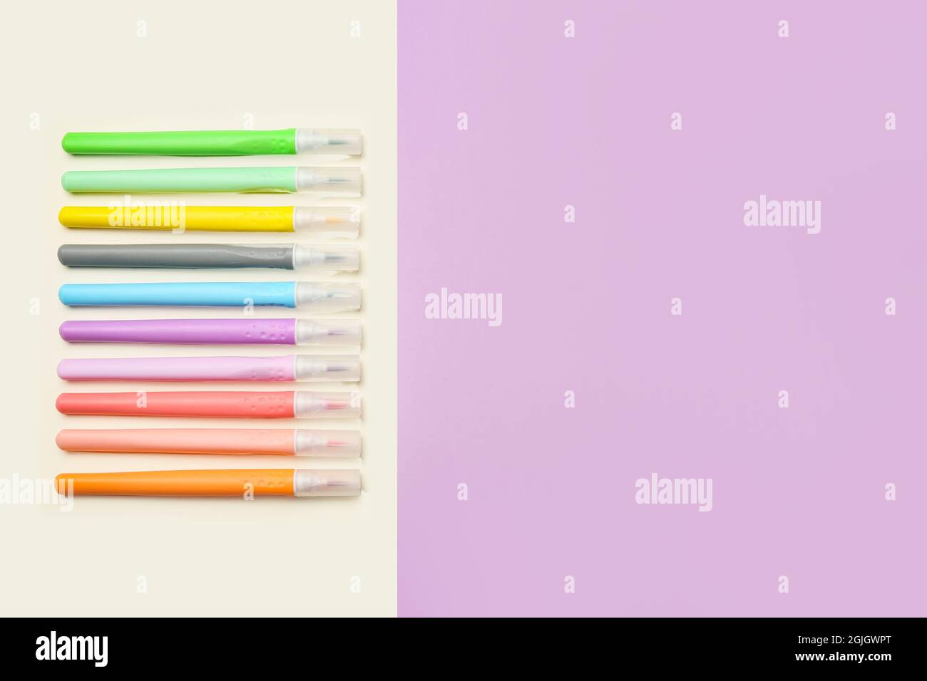 Colorful markers on color background Stock Photo - Alamy