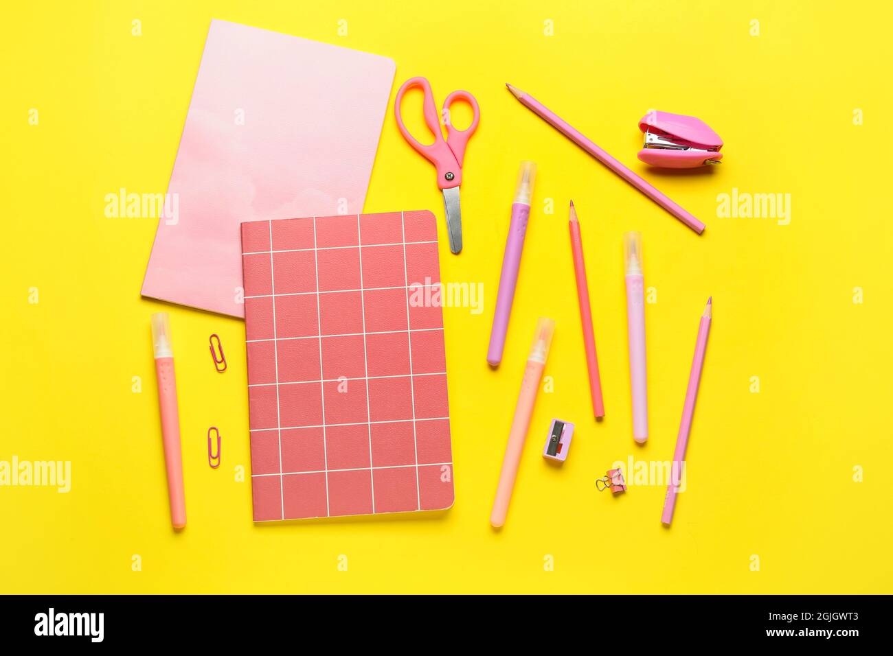 Stationery supplies on color background Stock Photo - Alamy