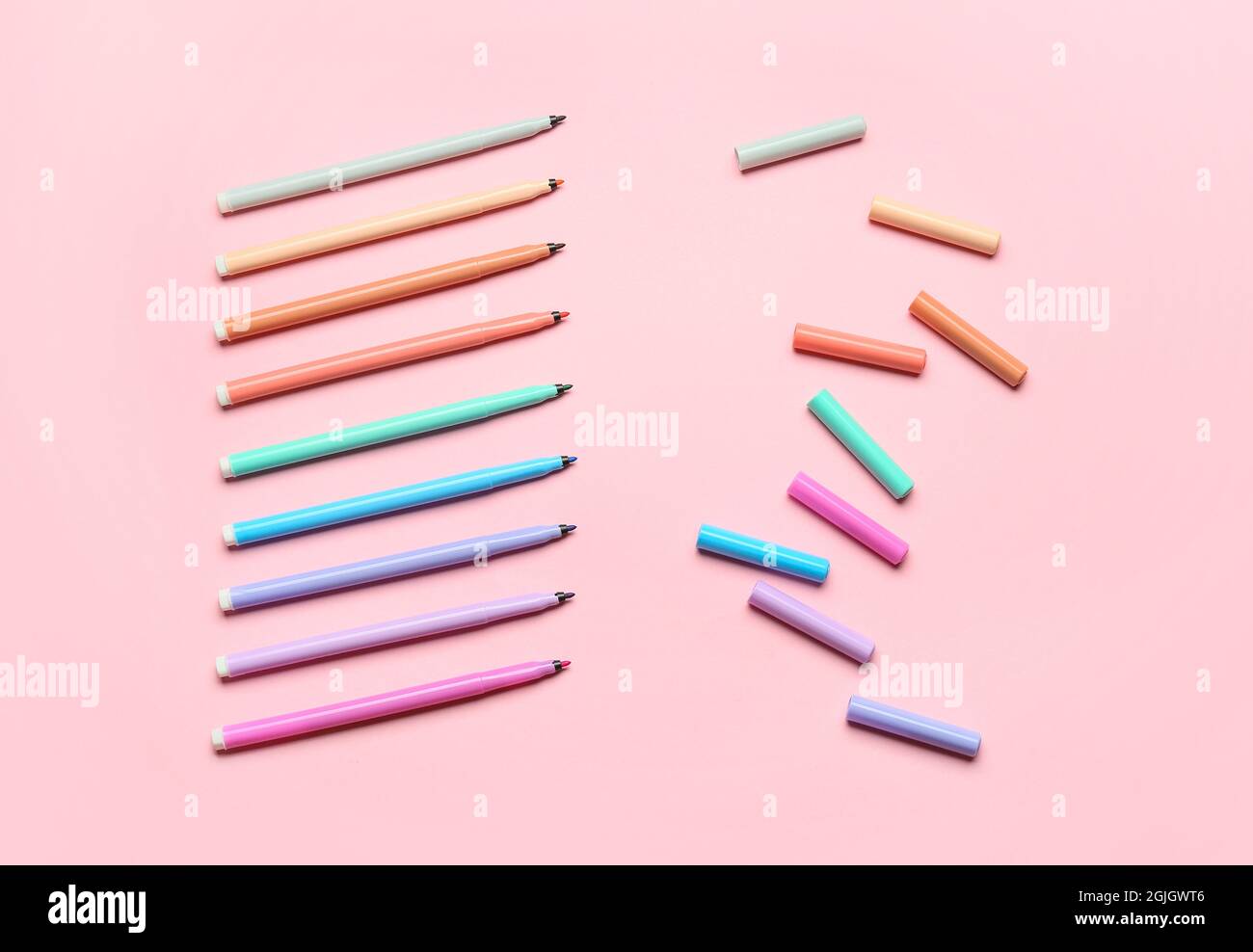 Colorful markers on color background Stock Photo - Alamy