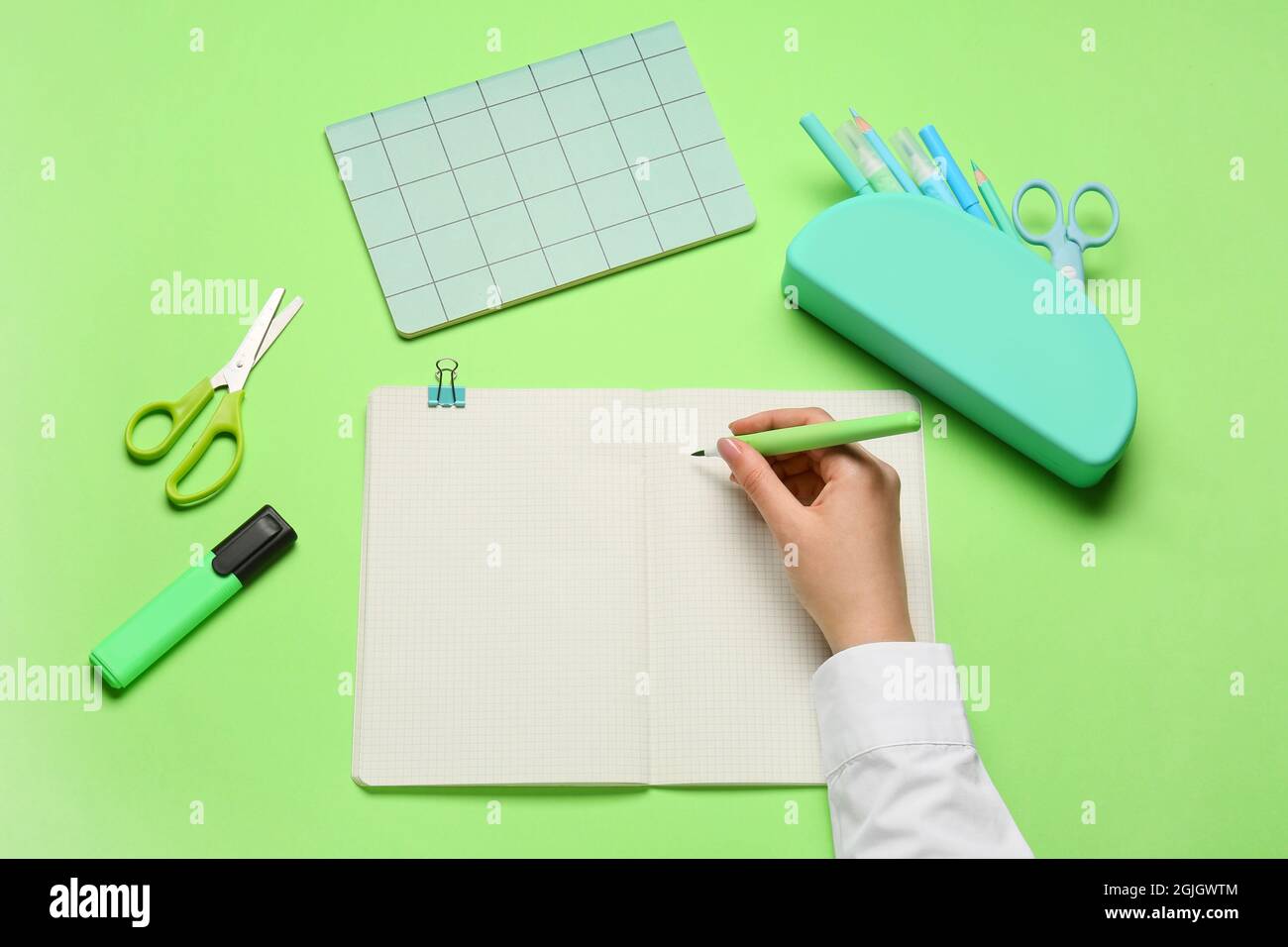 Female hand different stationery hi-res stock photography and images ...