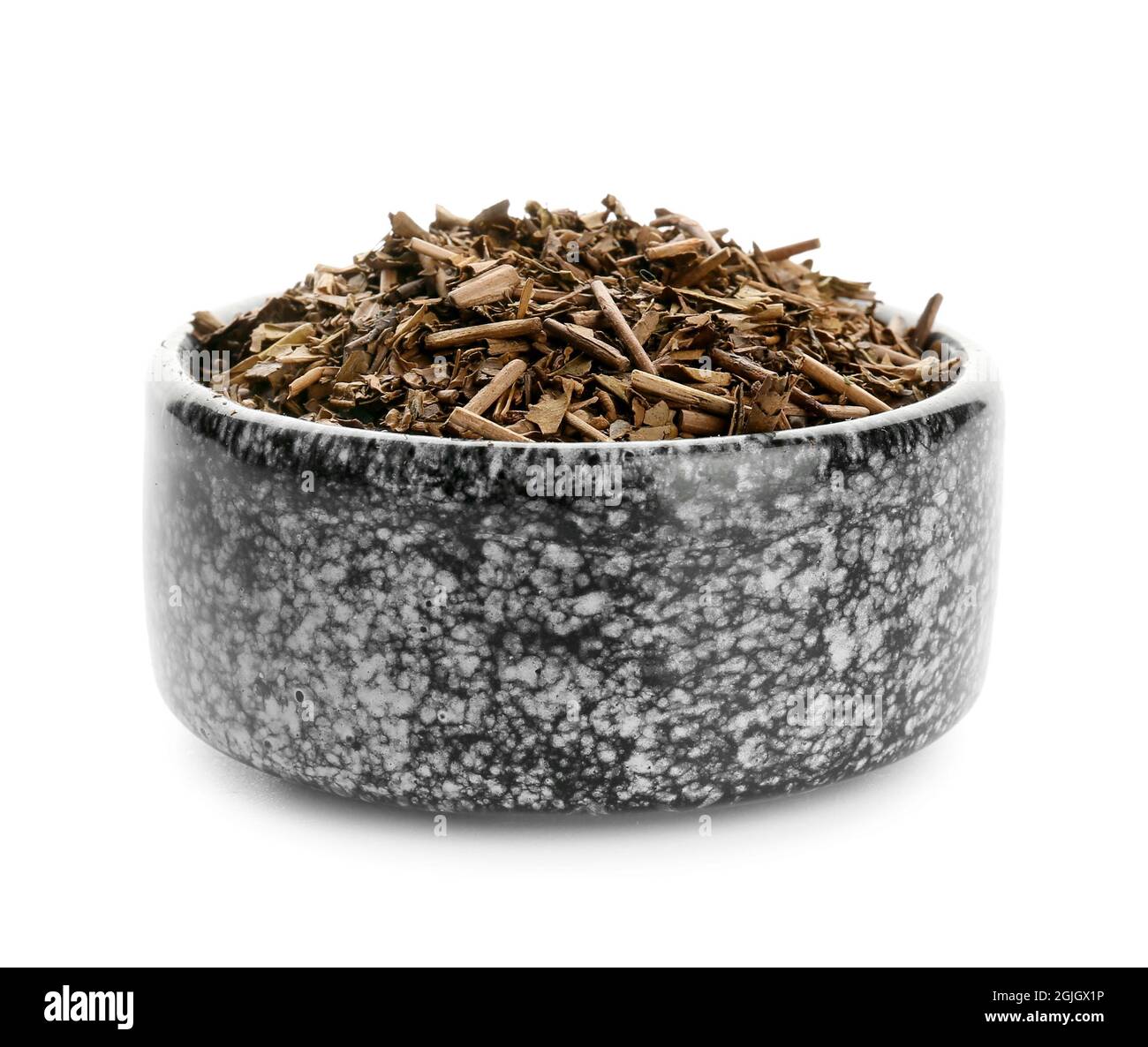 Bowl of dry hojicha green tea on white background Stock Photo - Alamy