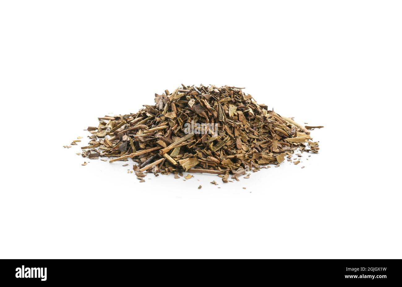 Pile of dry hojicha green tea on white background Stock Photo - Alamy