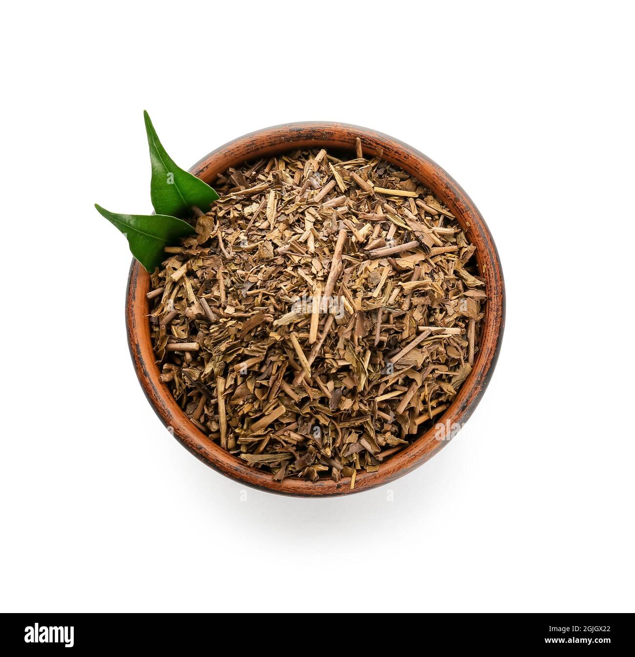 Bowl of dry hojicha green tea on white background Stock Photo - Alamy