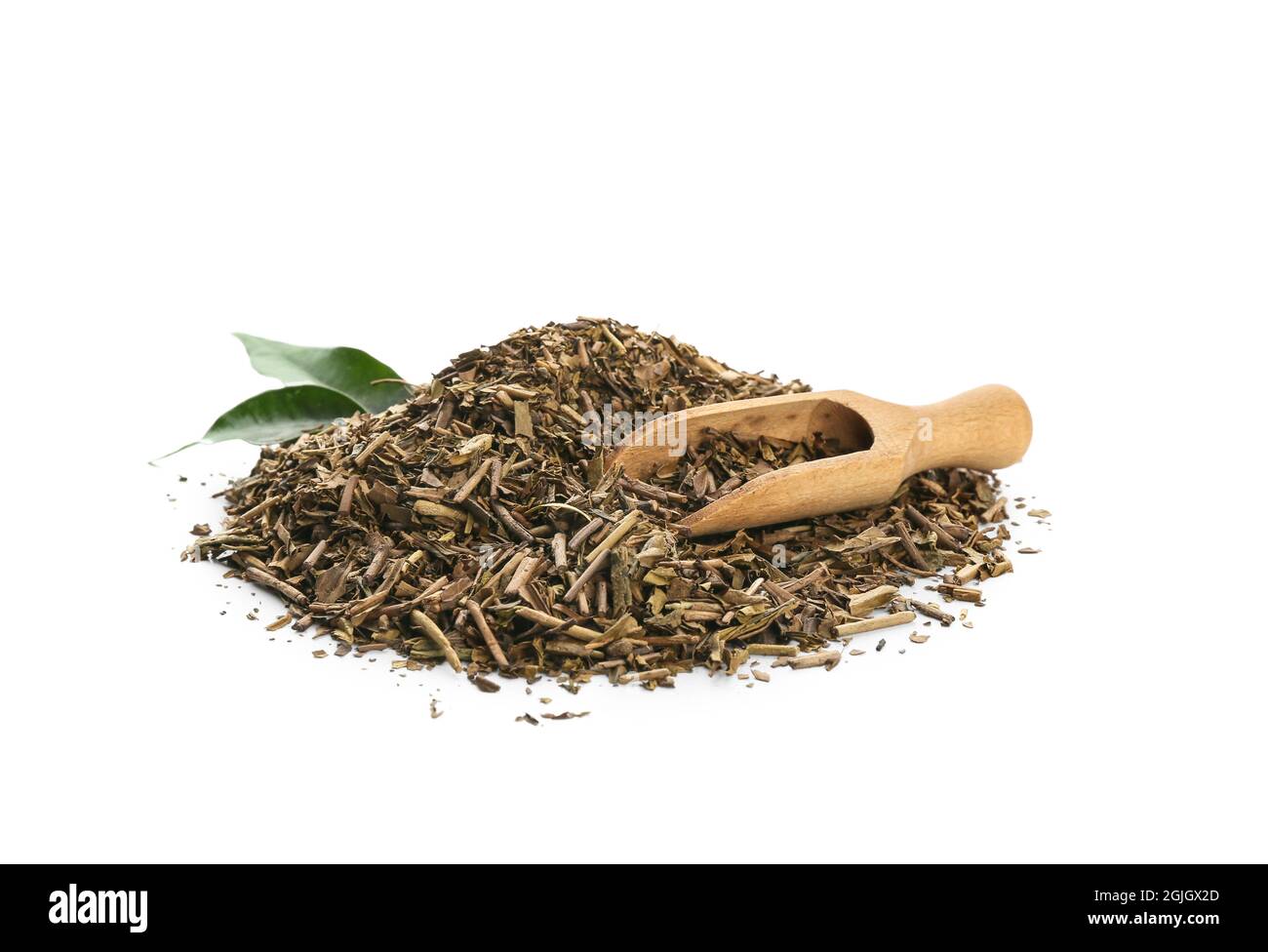 Pile of dry hojicha green tea on white background Stock Photo - Alamy