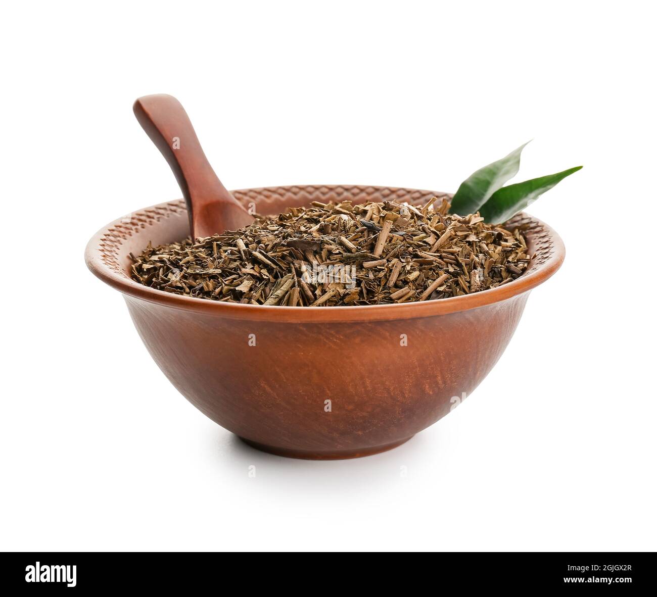 Bowl of dry hojicha green tea on white background Stock Photo - Alamy