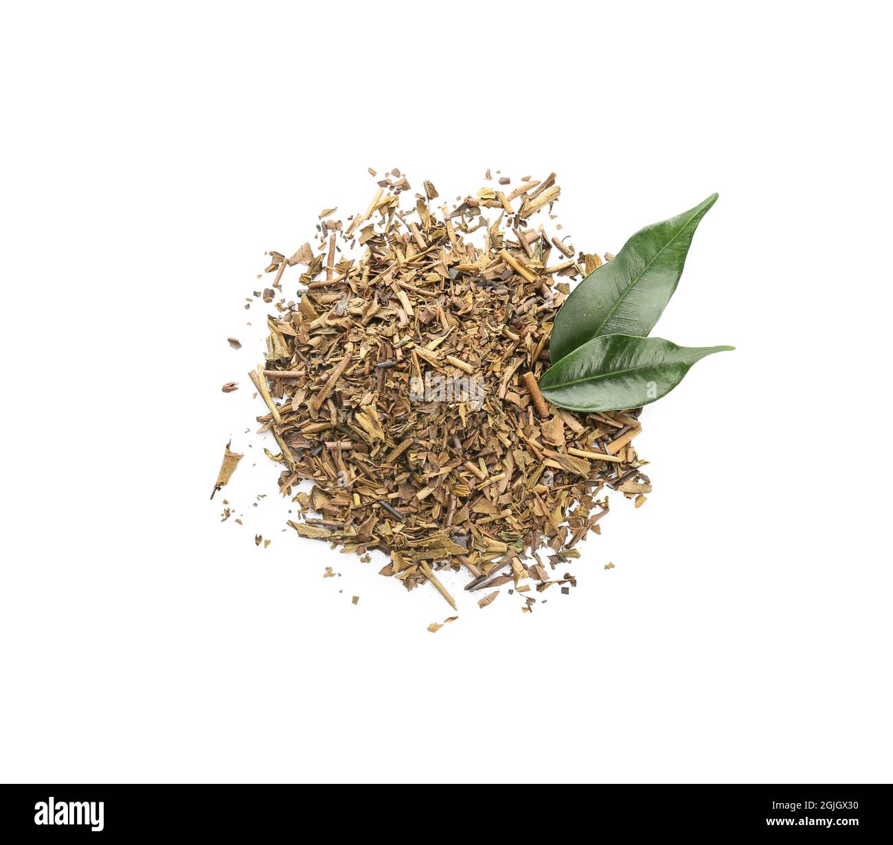 Pile of dry hojicha green tea on white background Stock Photo - Alamy
